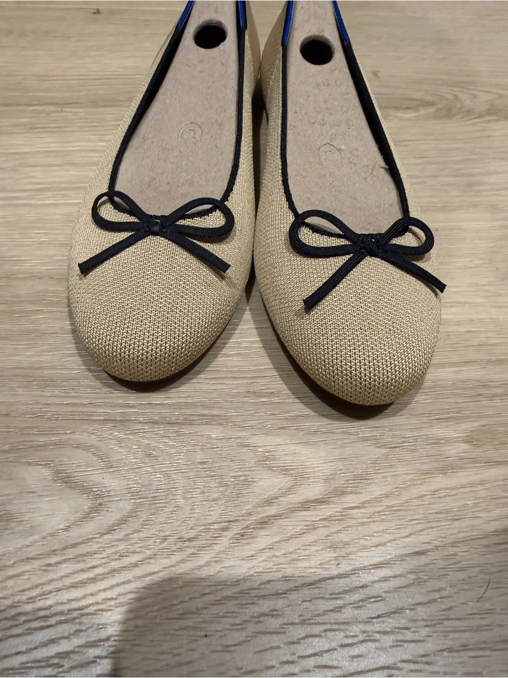Rothy's | Shoes | Rothys Beige Ballet Flats With Black Trim And Bow ...